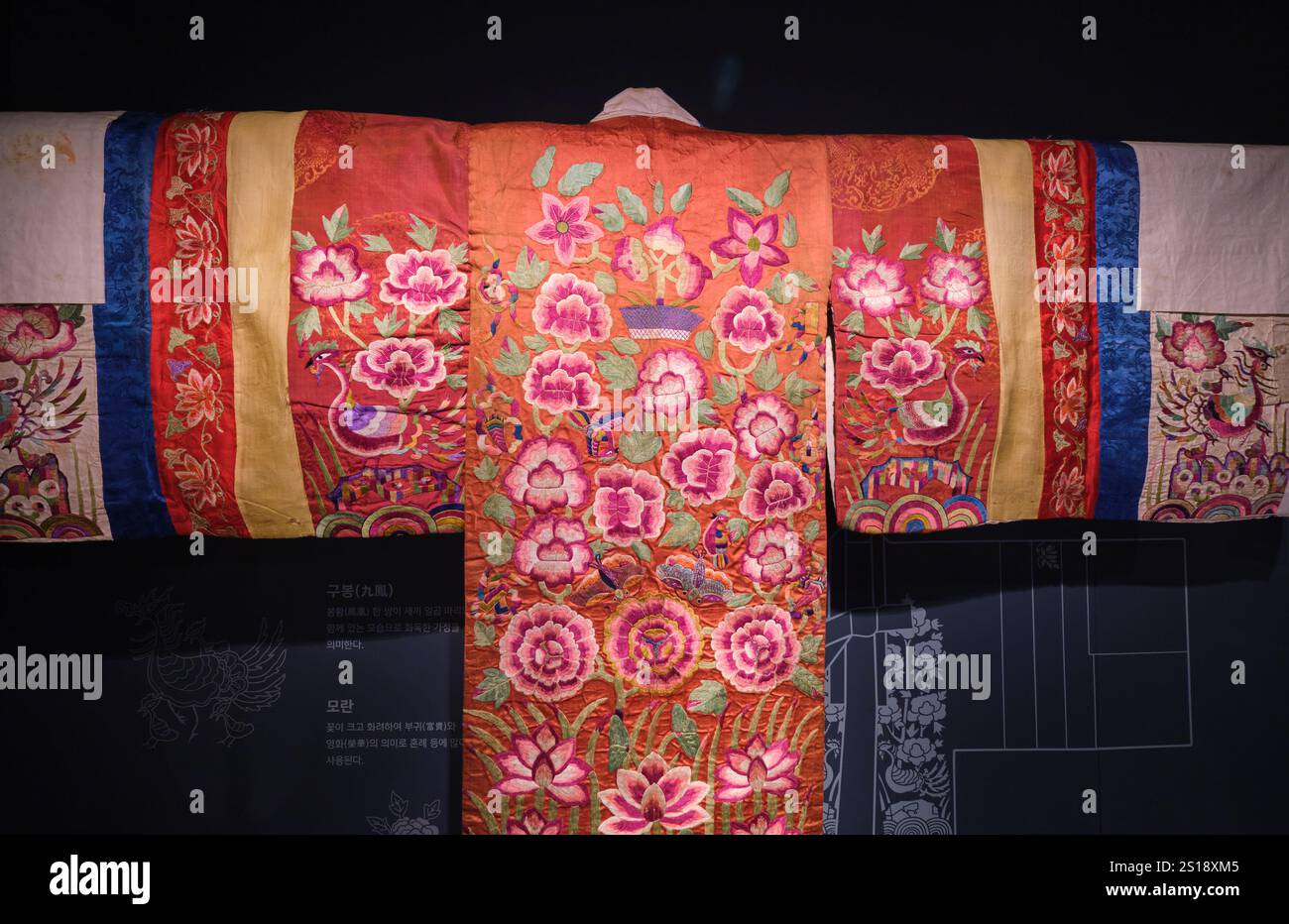 A colorful, pink flowered robe. At the Museum of Craft Art in Seoul ...