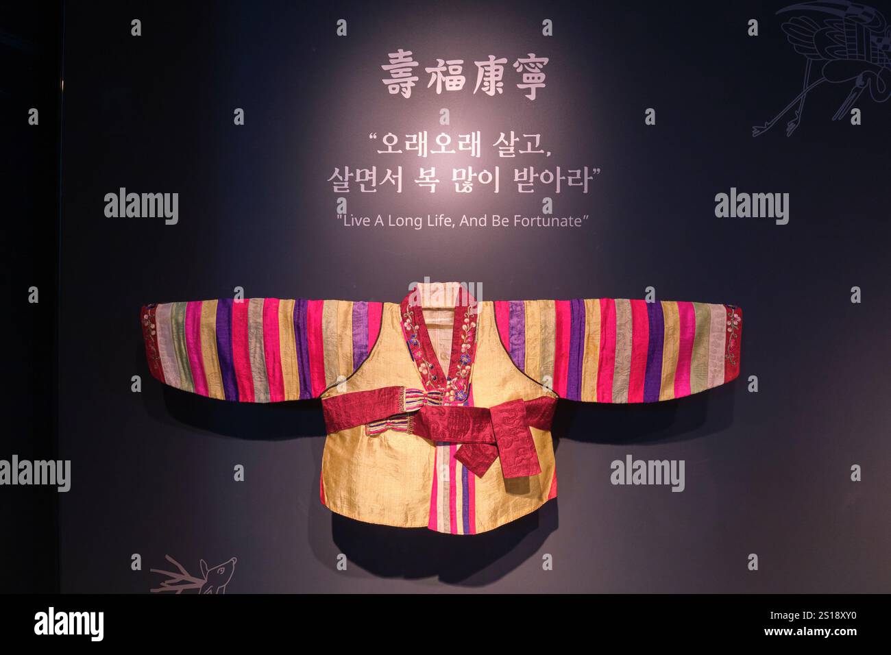 A colorful, striped robe. At the Museum of Craft Art in Seoul, South ...