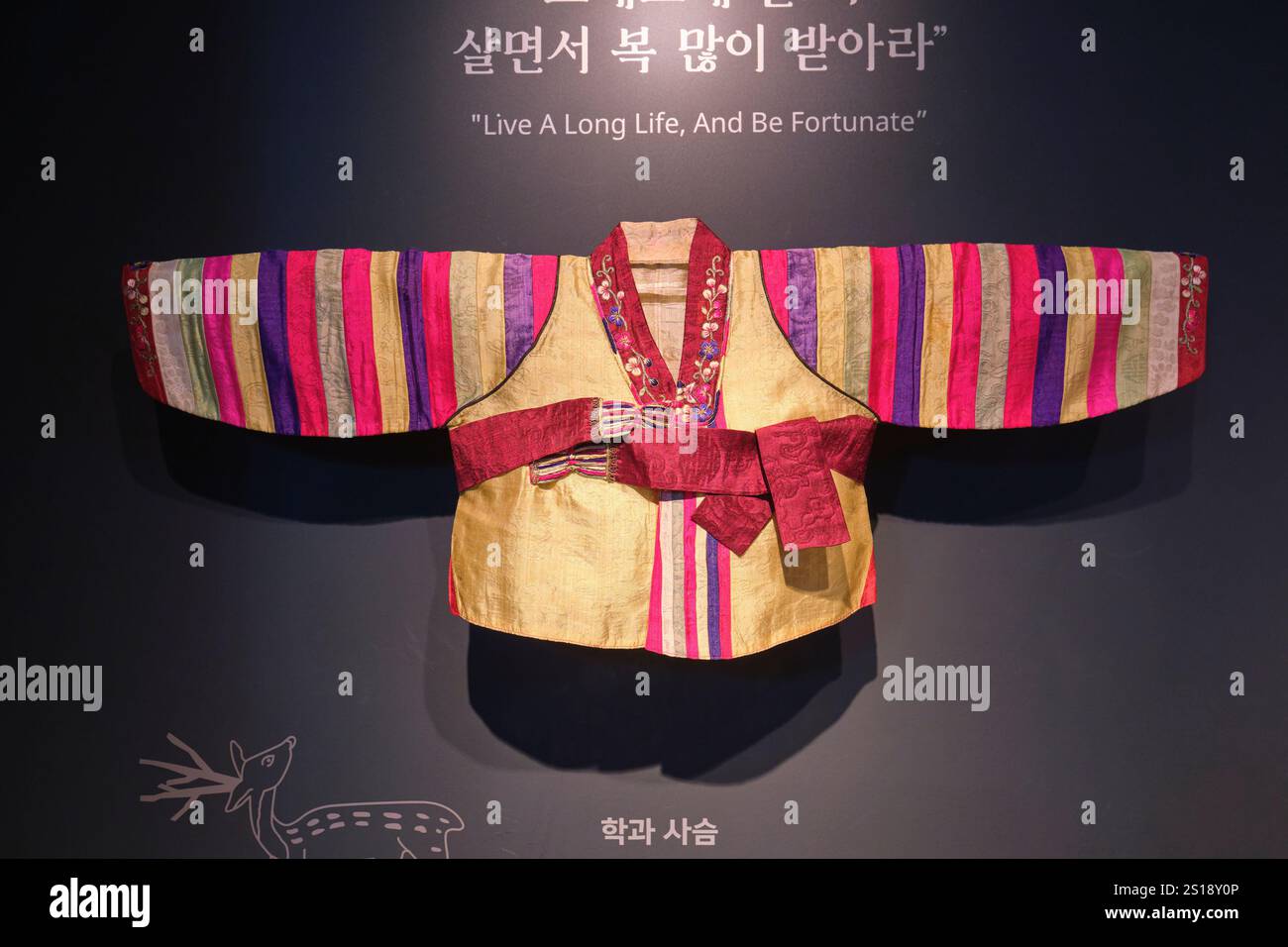 A colorful, striped robe. At the Museum of Craft Art in Seoul, South ...