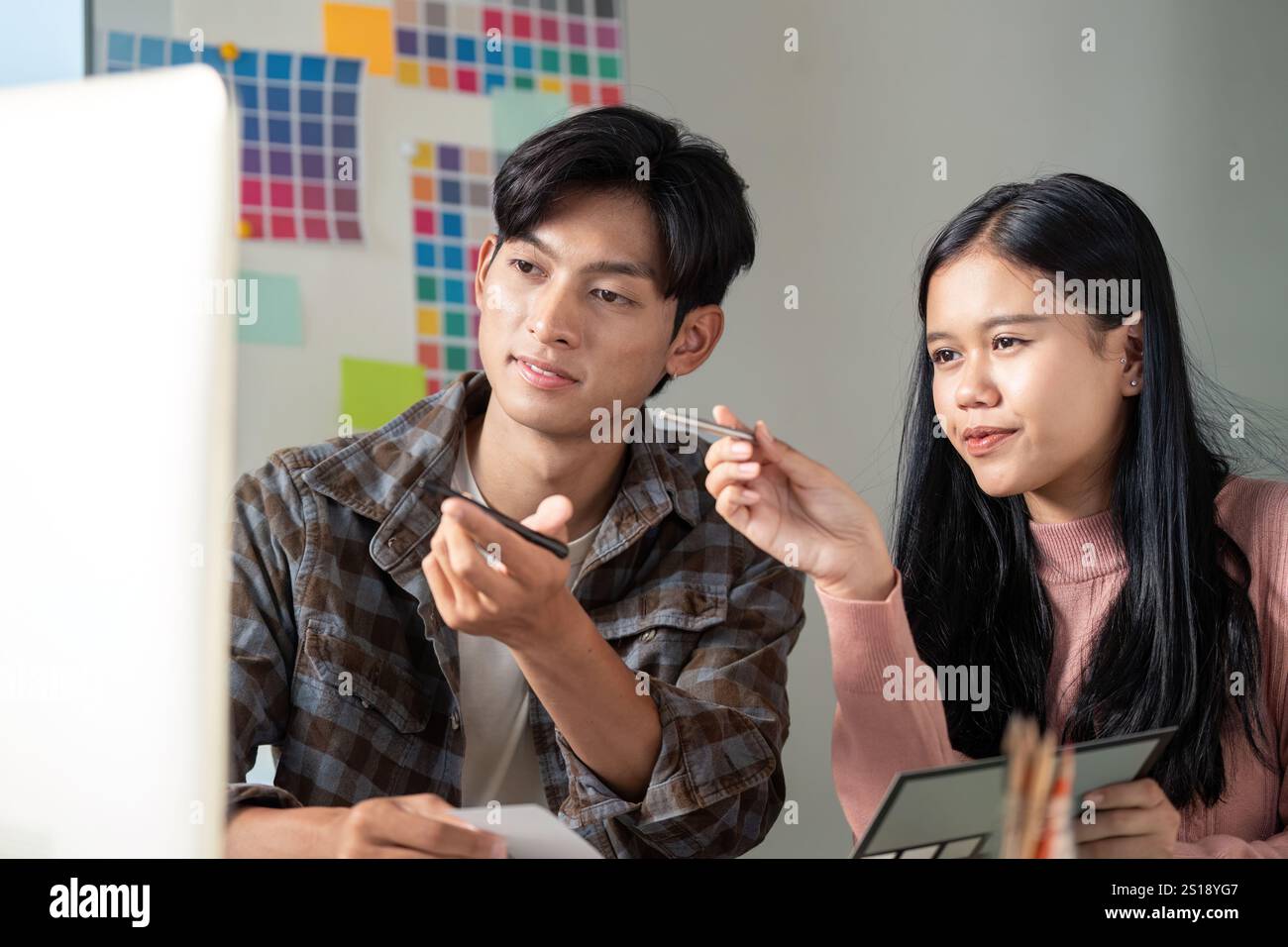 Creative team graphics design collaboration in modern workspace ...