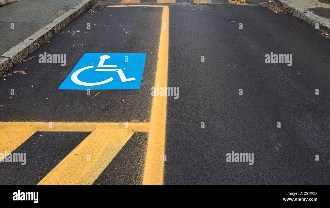 Disabled Parking Space Logo Sign on a City Street in Italy Front view ...