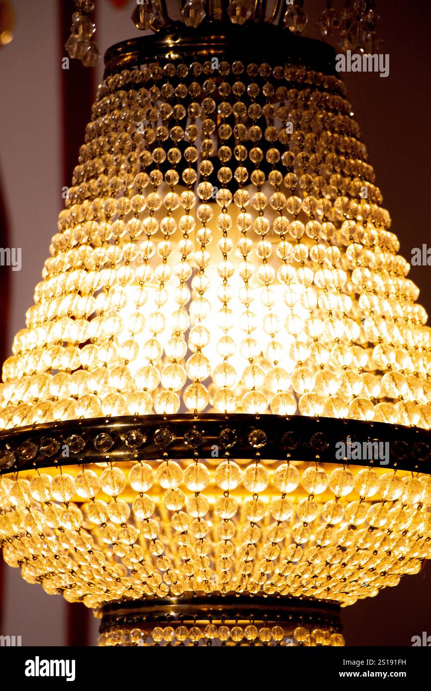 Old hanging chandelier turned on close up at home,vintage chandelier ...