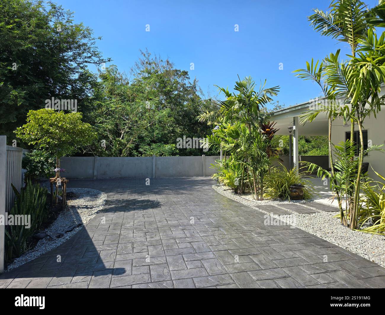 In Pattaya, Thailand, a stunning stamped concrete driveway showcases ...