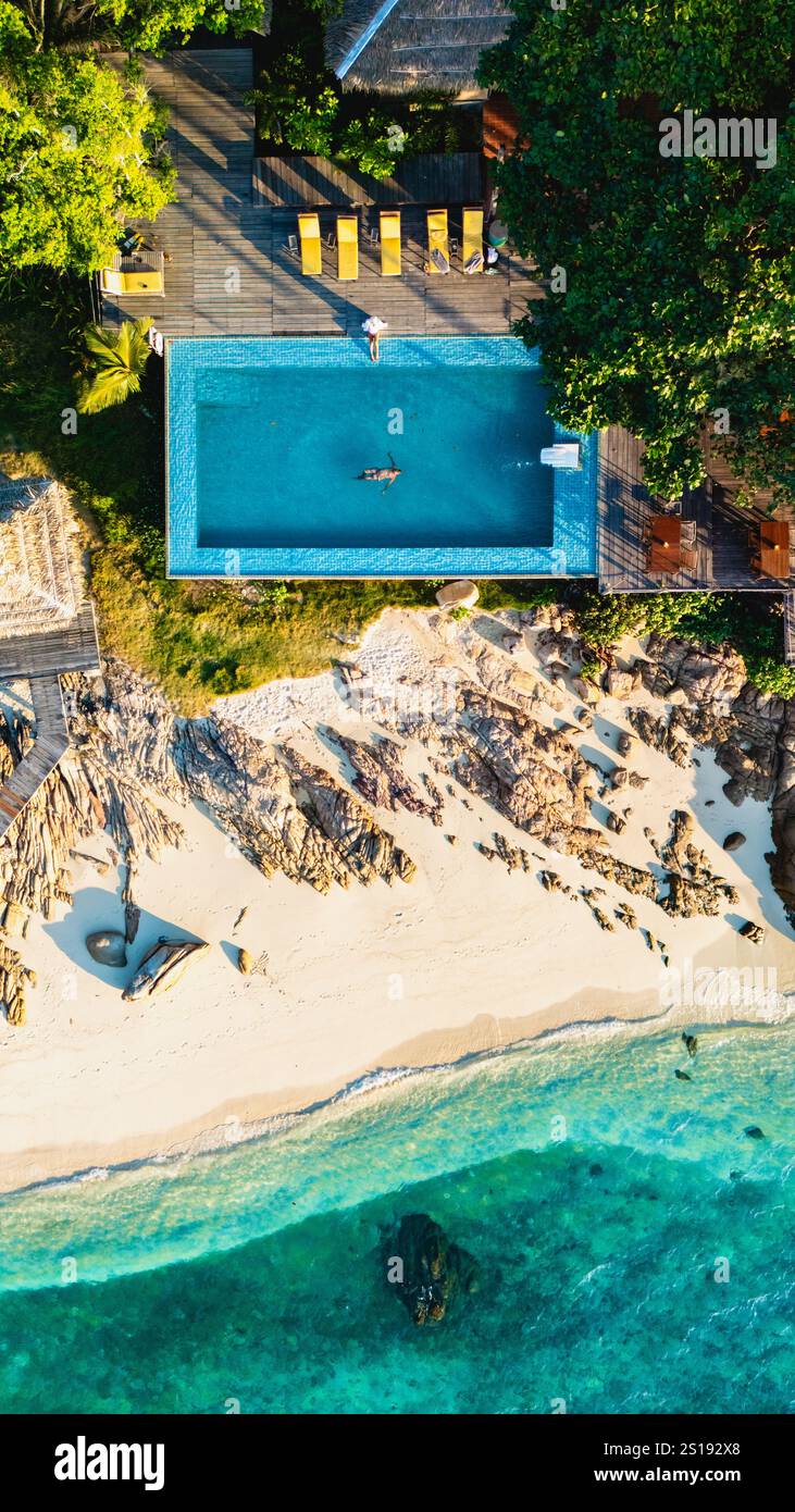 Overlooking the clear turquoise waters of a Thai Island, an inviting ...