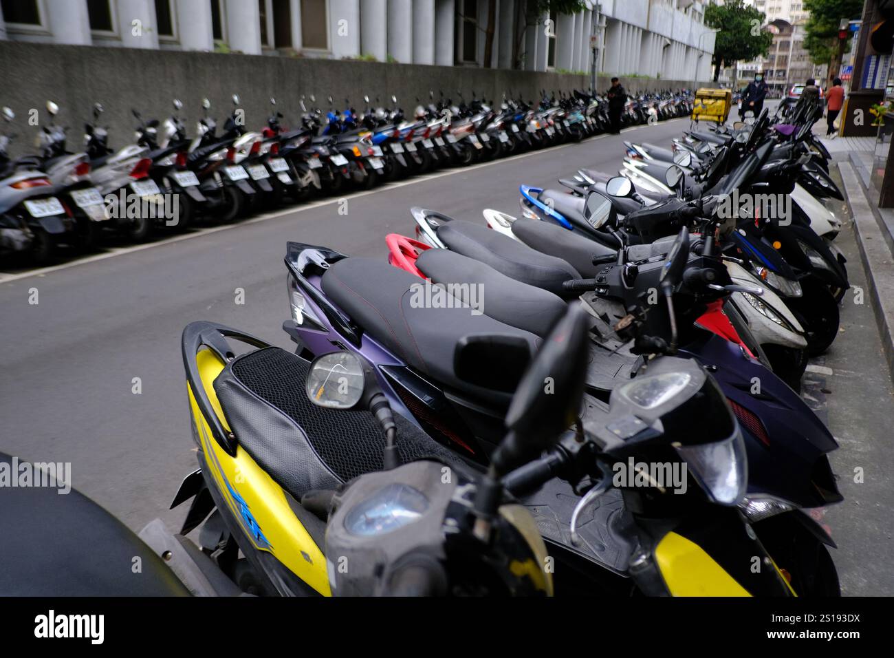 The roads in Taipei are filled with parked motorbikes. In Taipei ...