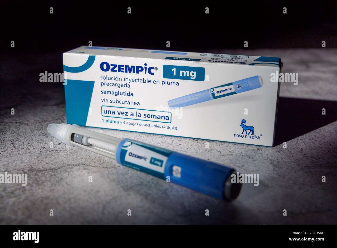 Visual of Ozempic Medication and Measuring Tape on a Concrete Table ...