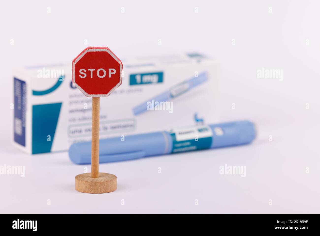Toy Stop Sign Next to Ozempic 1 ml Medication Box and Injection Pens on ...