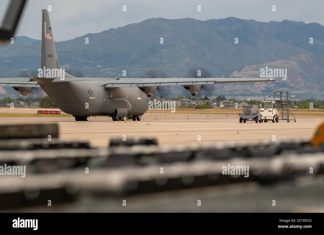 A C-130J Super Hercules sits on the flight line at Peterson Space Force ...