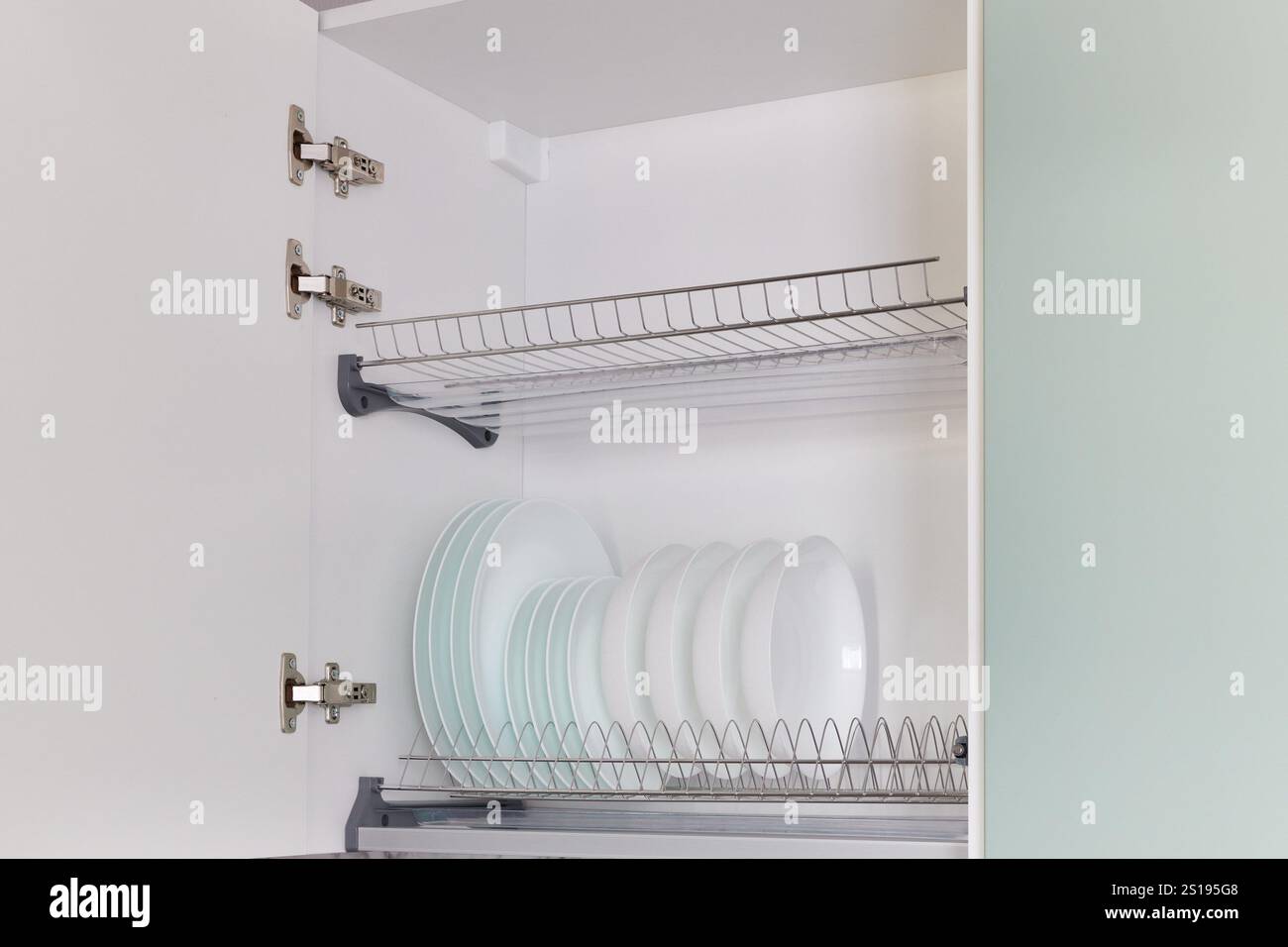 Stylishly Modern Kitchen Cabinet Featuring Plates and Wire Rack for ...