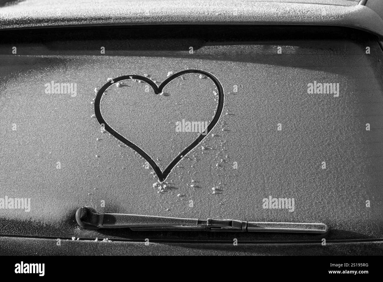 Cold Love: Heart Shape on Frosted Glass Stock Photo - Alamy