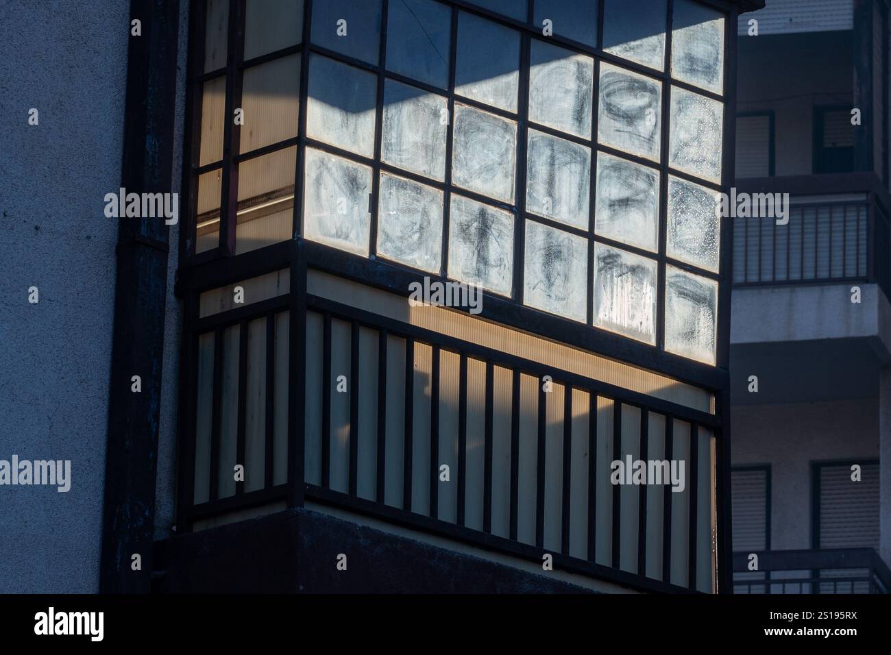 Sunrise Glow: Square Windows and a Balcony Corner of Hope Stock Photo ...