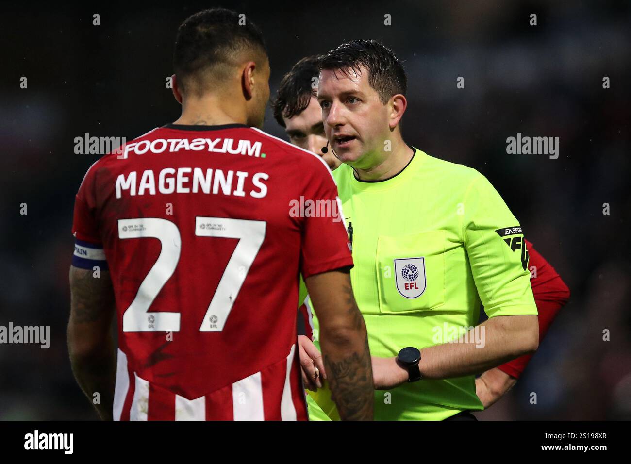Referee Scott Simpson talks during the Sky Bet League One match at ...