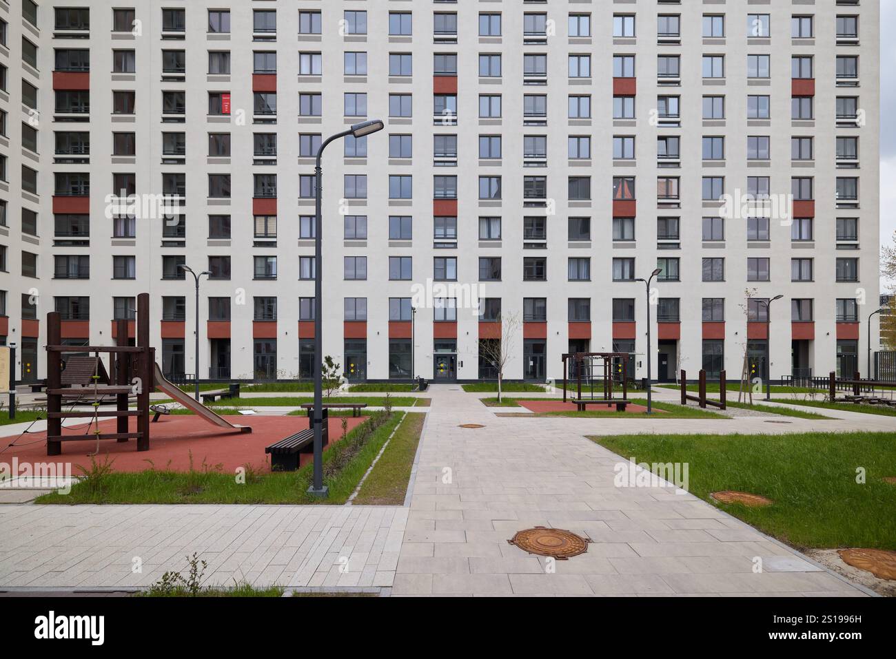 Modern Residential Complex with Playground Facilities for All Ages and ...