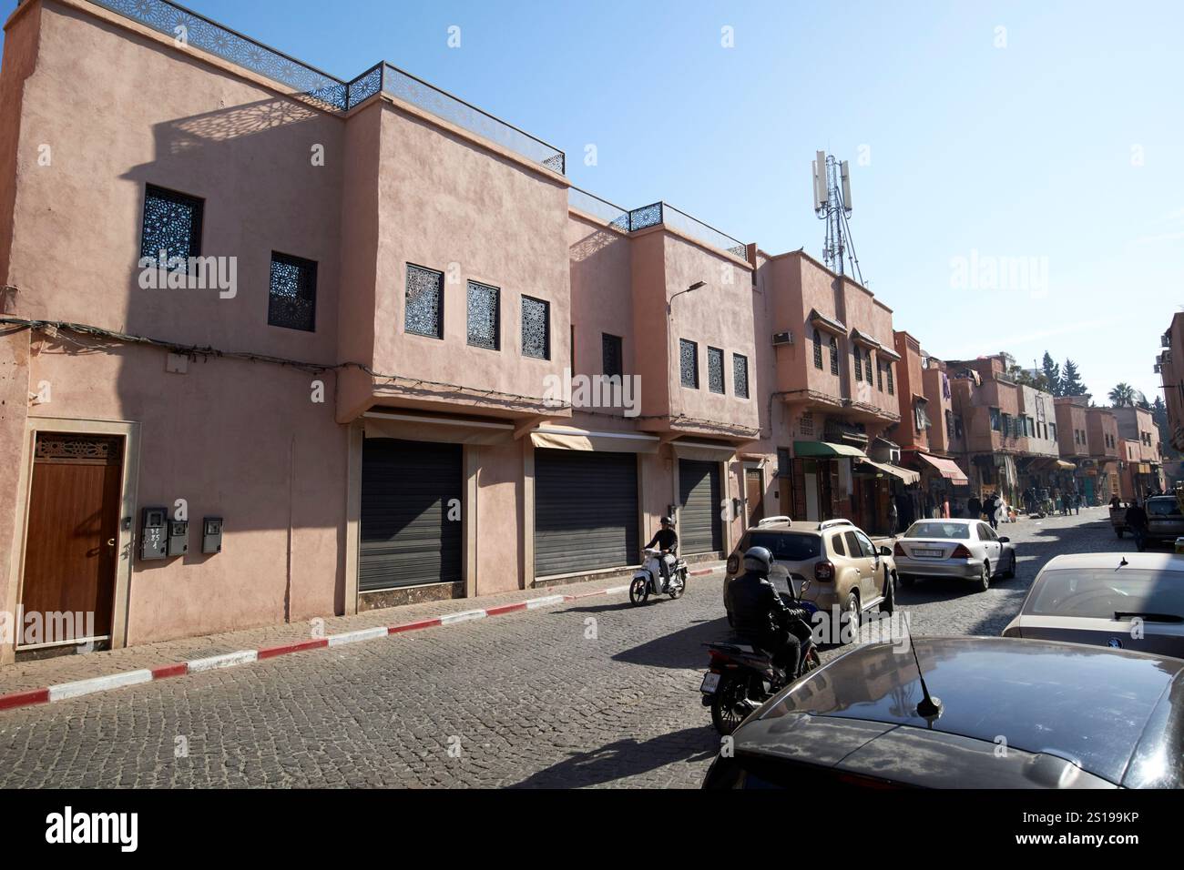 red coloured buildings in the medina old city of marrakesh, morocco ...
