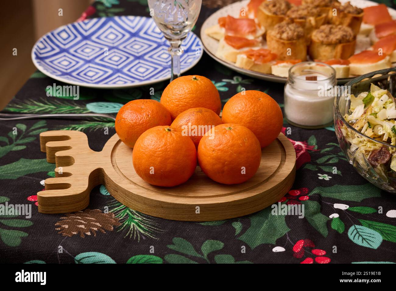 A Beautifully Set Festive Table Featuring Fresh Oranges Alongside ...