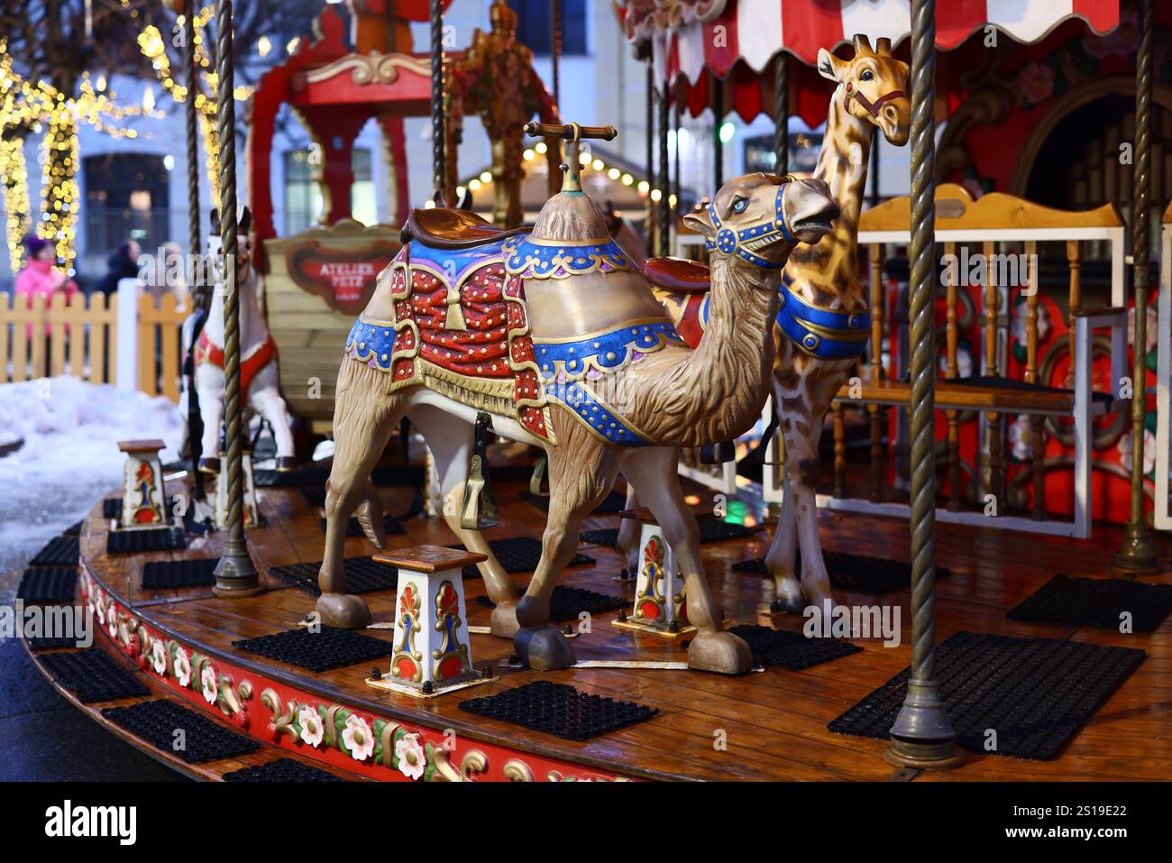 A Vibrant and Colorful Carousel Featuring a Camel and Other Beautifully ...