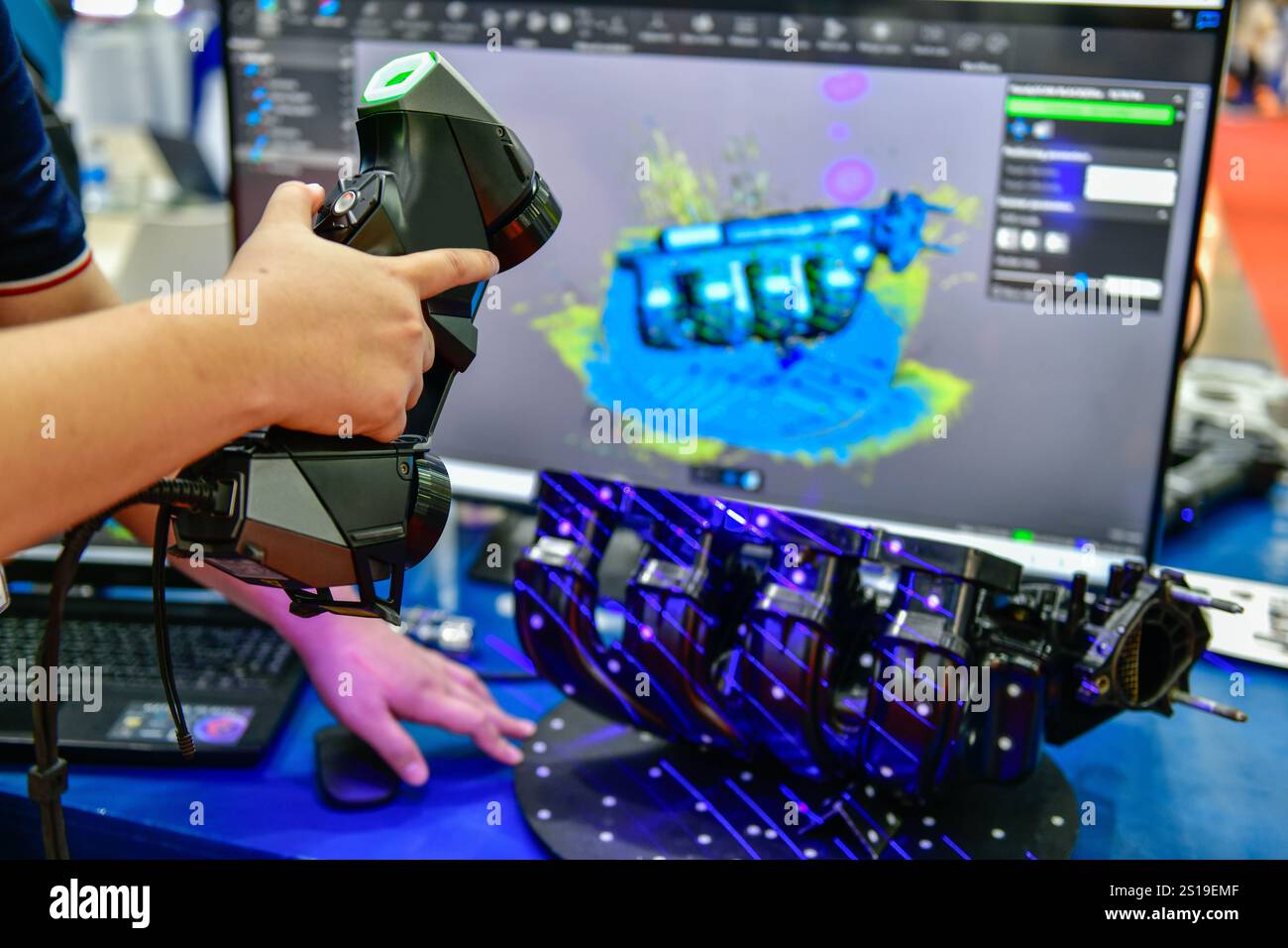 Portable 3D car-shaped handheld scanner is scanning to measure size and ...