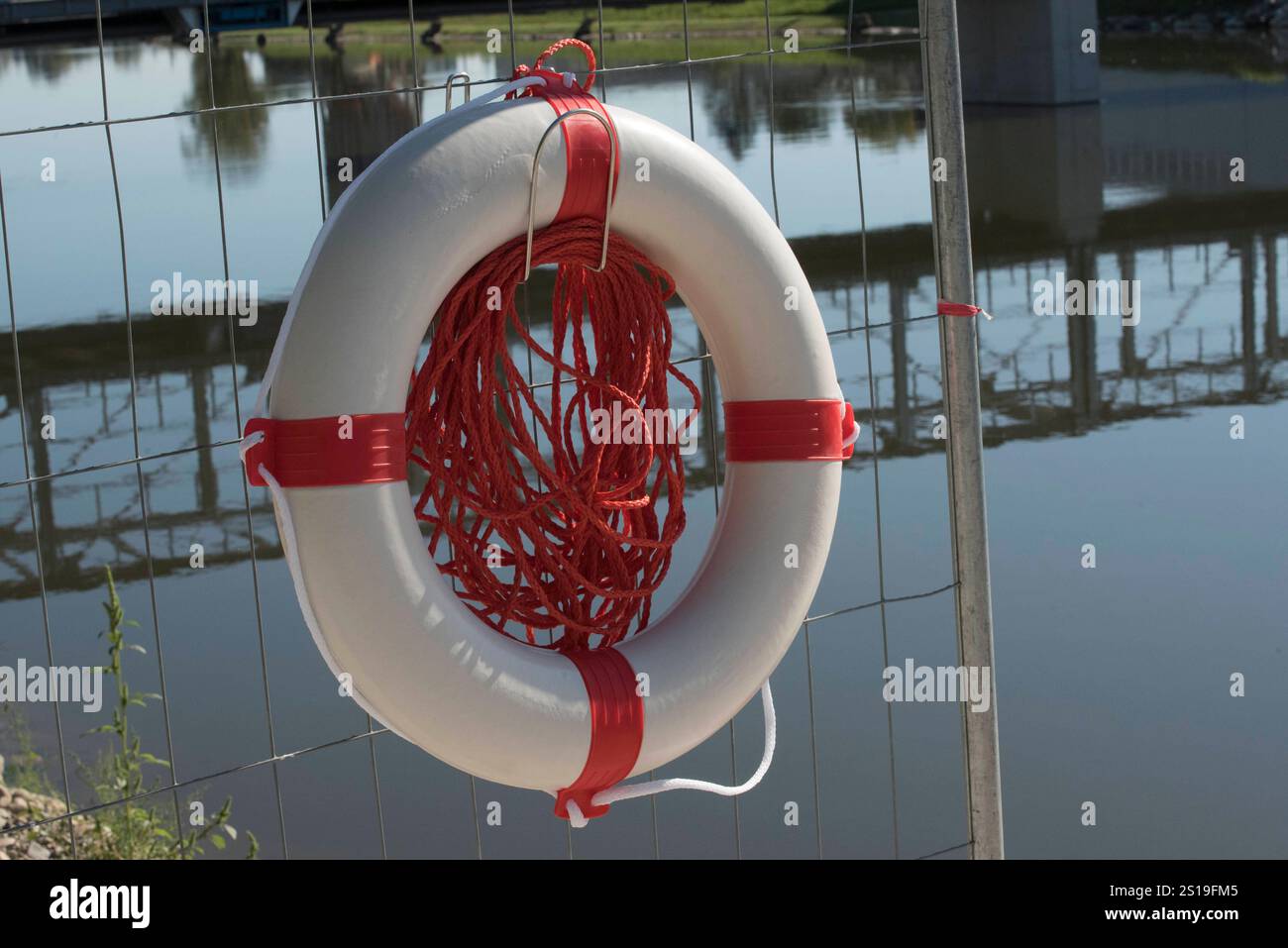 life belt with warning sign on risks and hazards in seafaring and ...