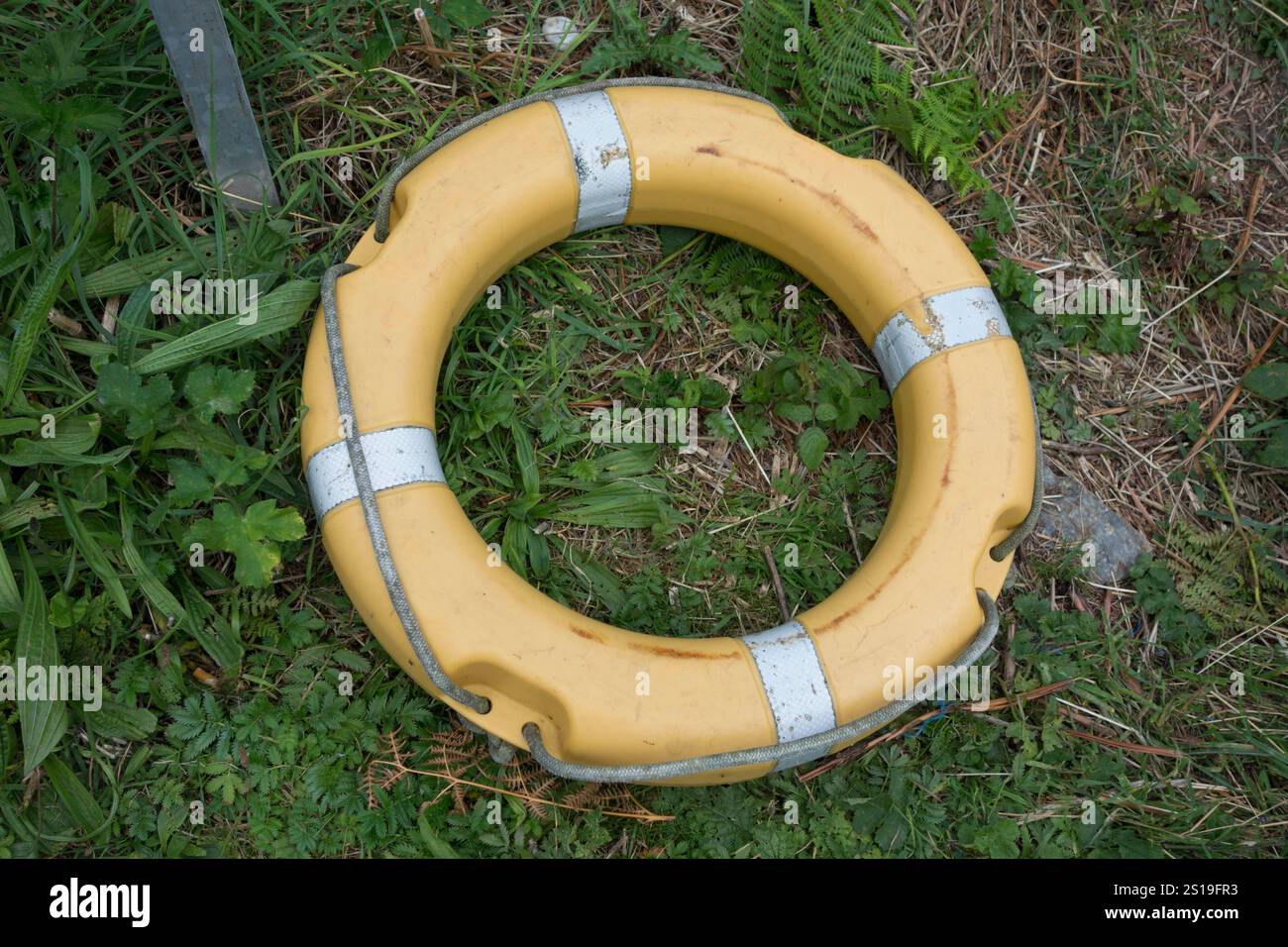 life belt with warning sign on risks and hazards in seafaring and ...