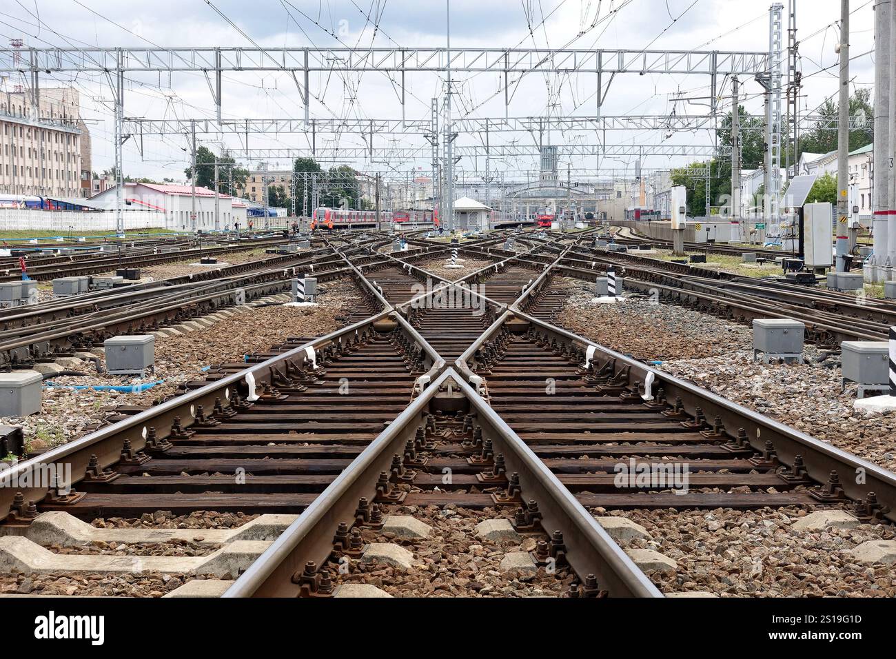 The captivating view of railroad tracks converging at a bustling and busy train junction Stock ...