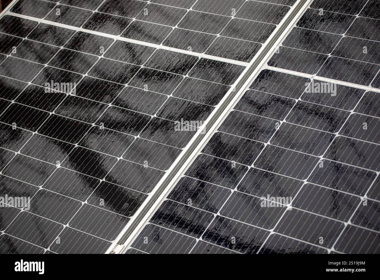 Rain-Drenched Black Solar Panels Generating Renewable Energy Stock ...