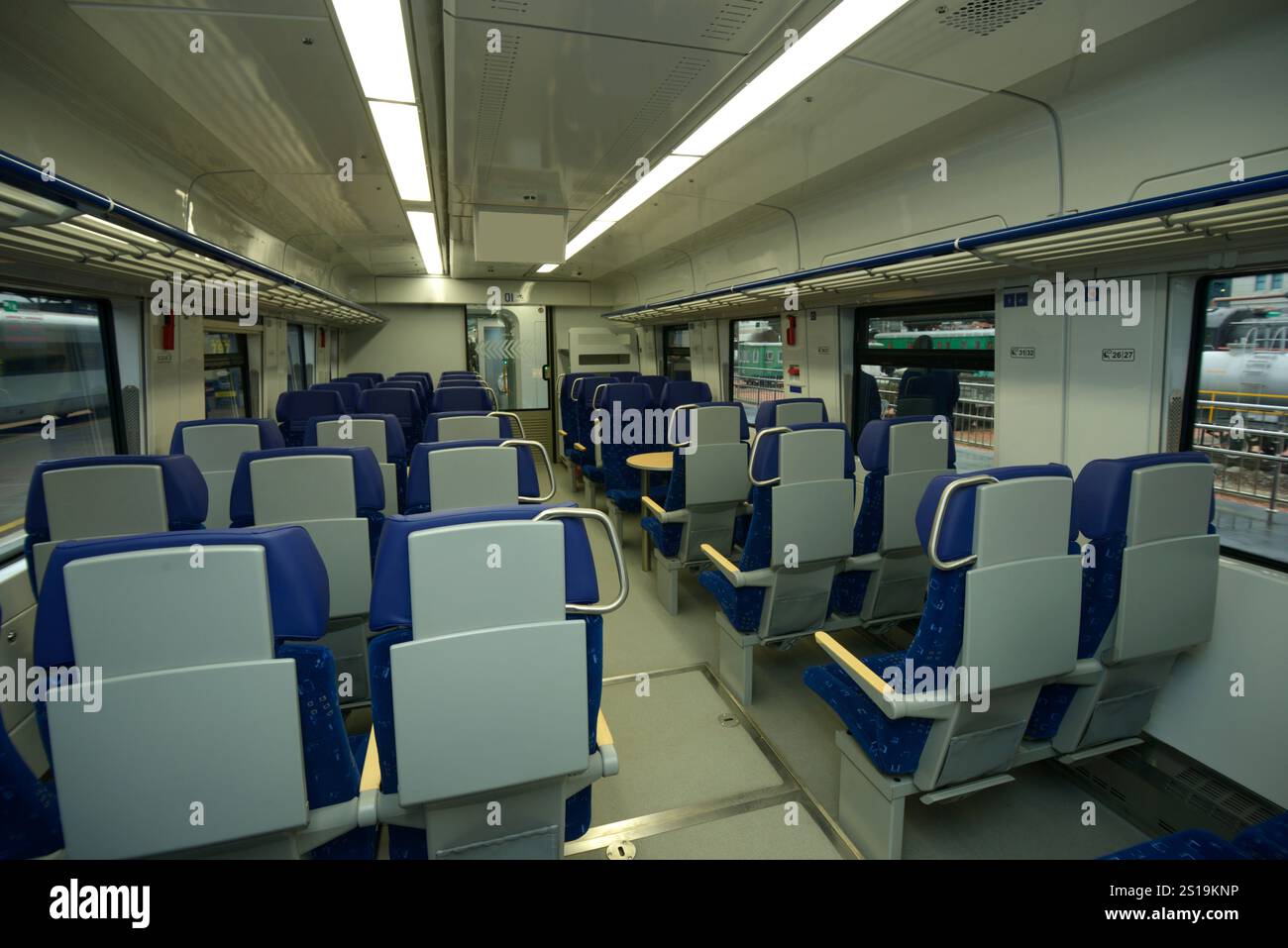 2 class compartment of the wagon of commuter train, seats and doors ...