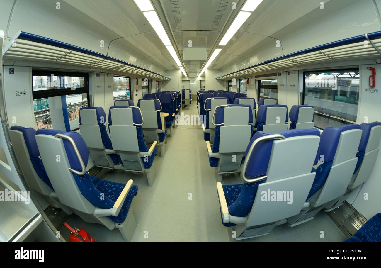 2 class compartment of the wagon of commuter train, seats and doors ...
