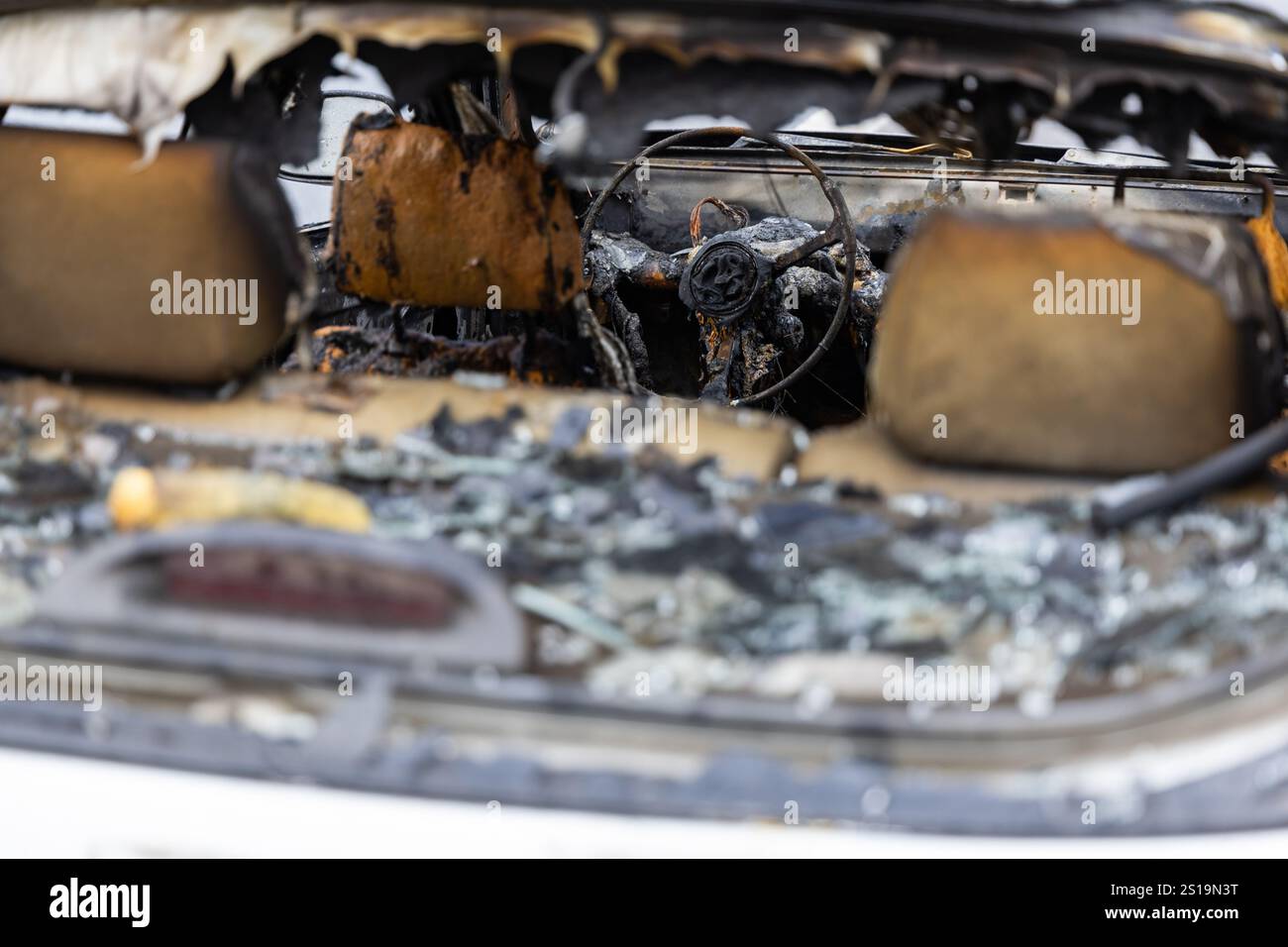 Interior of a burned passenger car. Major damage to the vehicle due to ...