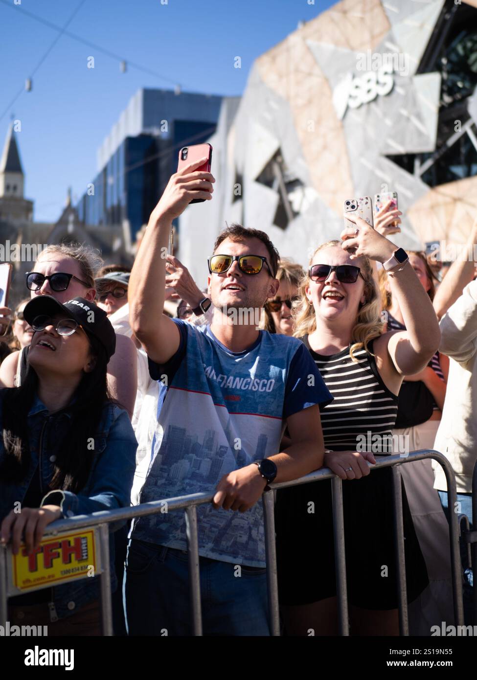 WIlliams fans are seen in the crowd. Robbie Williams performs a public ...