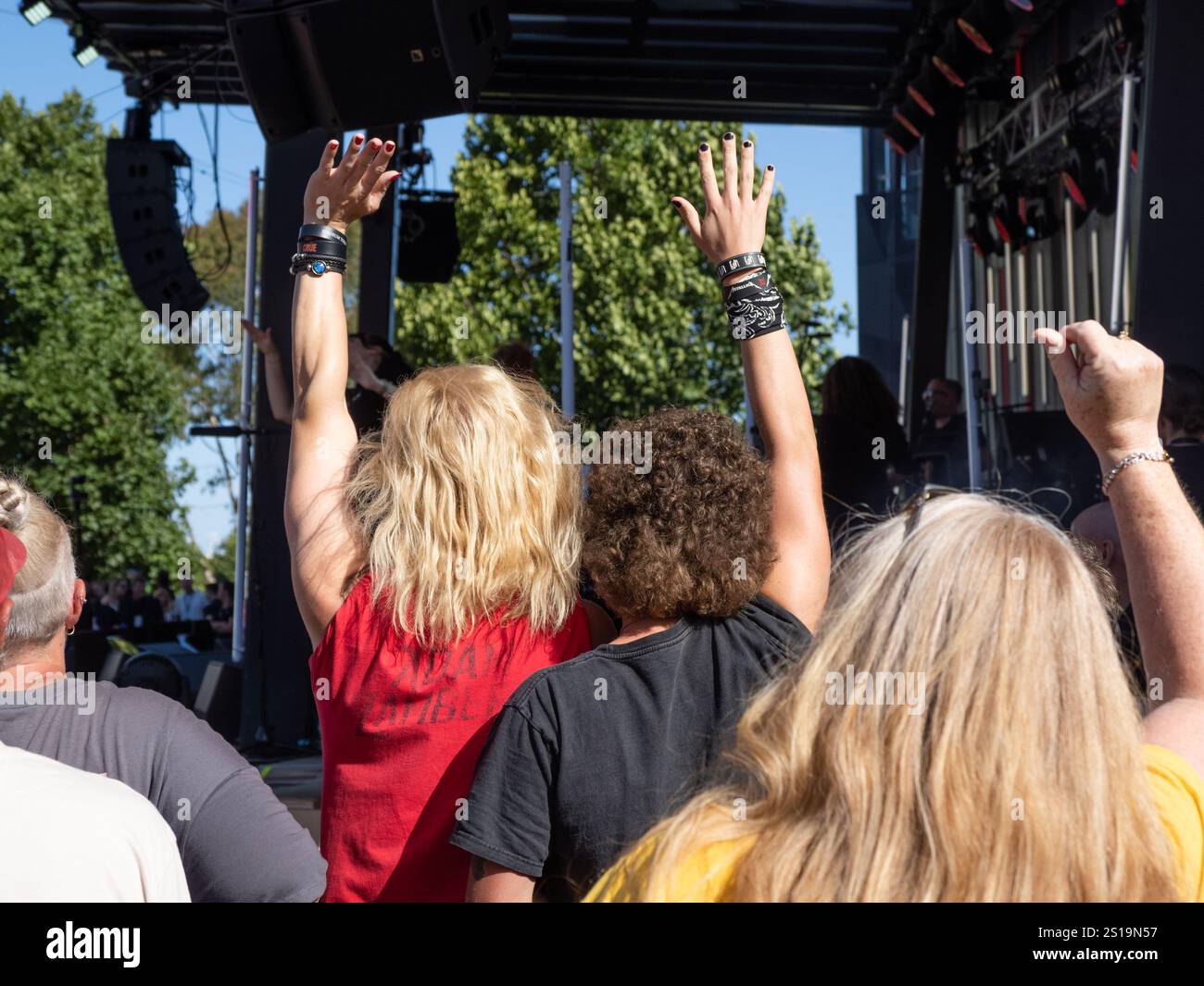 Fans cheer for Williams. Robbie Williams performs a public concert to ...