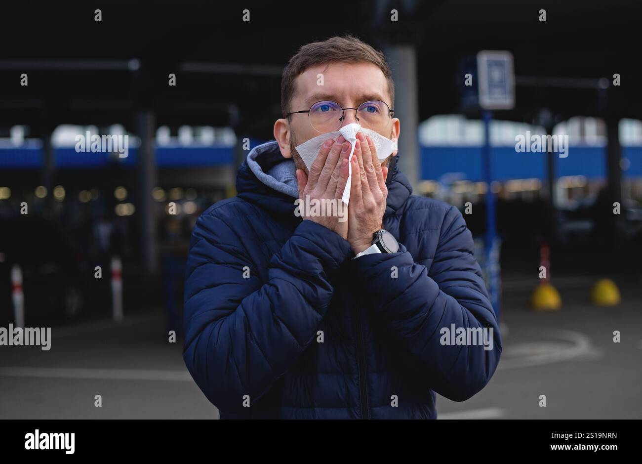 guy with a cold and a runny nose Stock Photo - Alamy