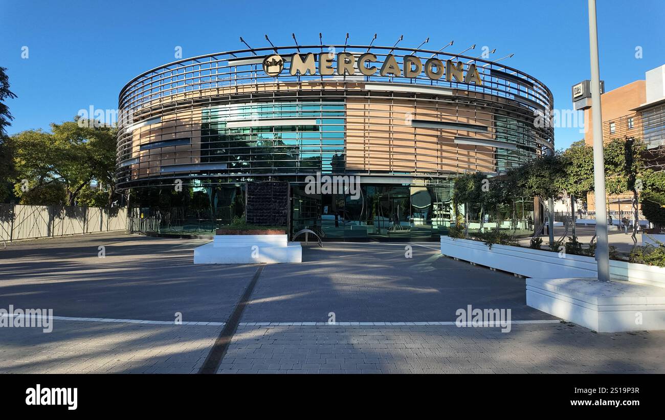 The exterior of a large Mercadona building in Seville, Spain, featuring ...