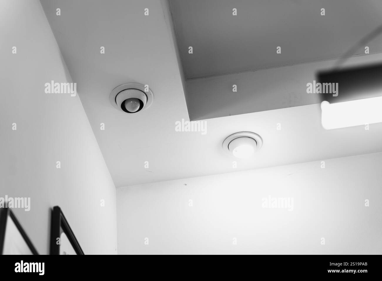 Unique ceiling design featuring modern lighting fixtures in a ...