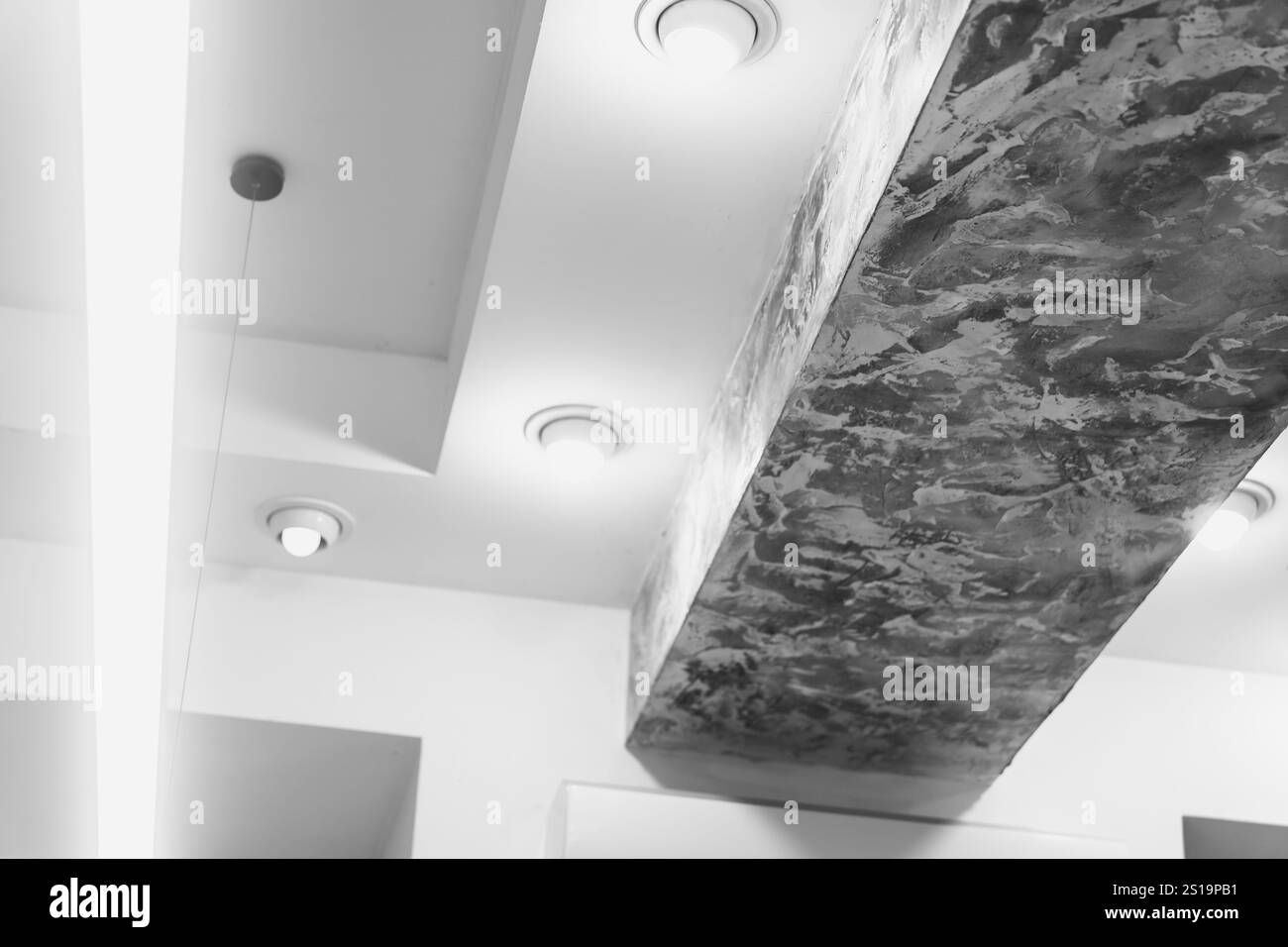 Unique architectural details of a modern interior ceiling at a stylish ...