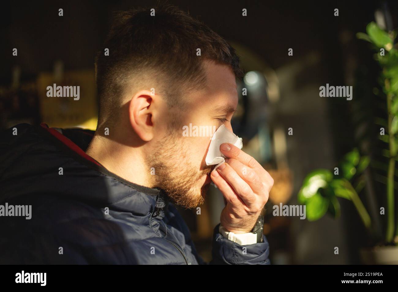 guy with a cold and a runny nose Stock Photo - Alamy