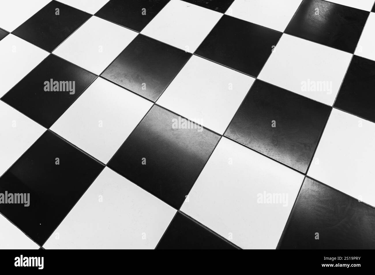 Black and white checkerboard floor with clean tiles and shiny surface ...