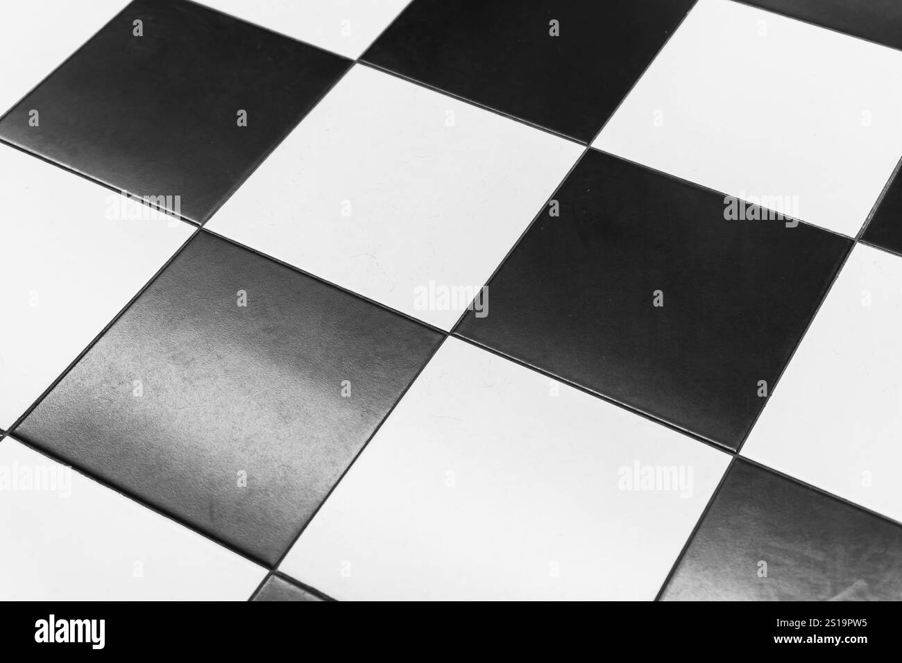 Black and white checkerboard pattern on a polished surface Stock Photo ...