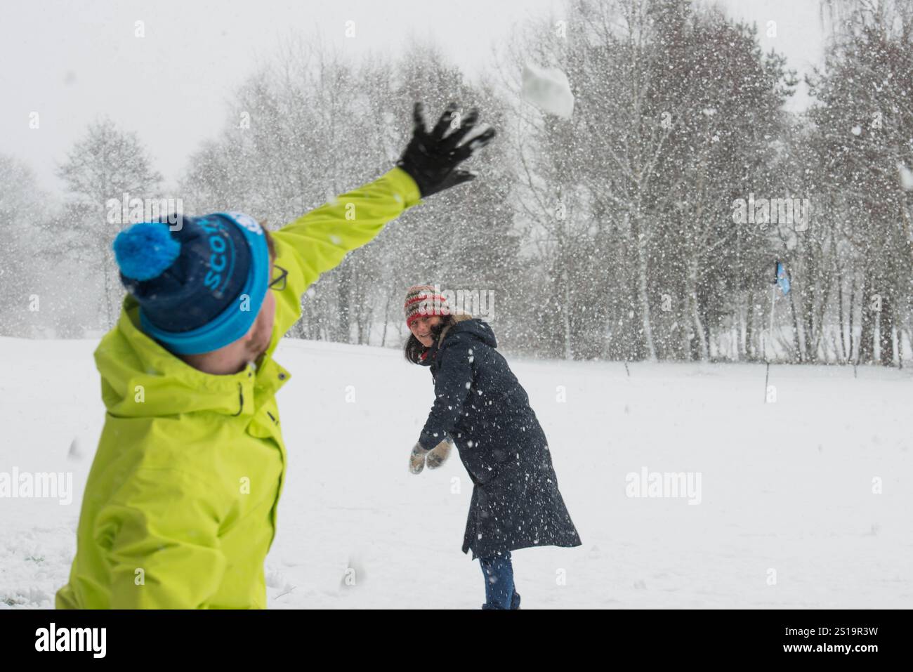 UK Weather. Aberdeen Scotland,. A family snowball fight on a snow ...
