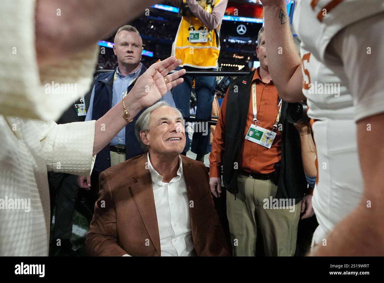 Texas Gov. Greg Abbott during the quarterfinals of a College Football ...