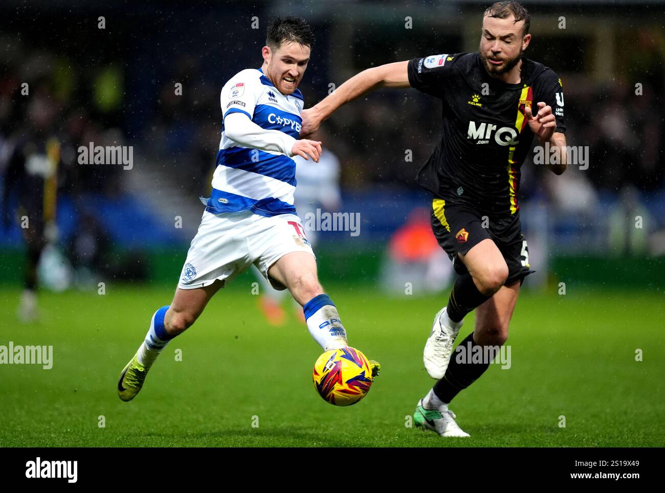 Queens Park Rangers' Paul Smyth (left) with Watford's Ryan Porteous ...