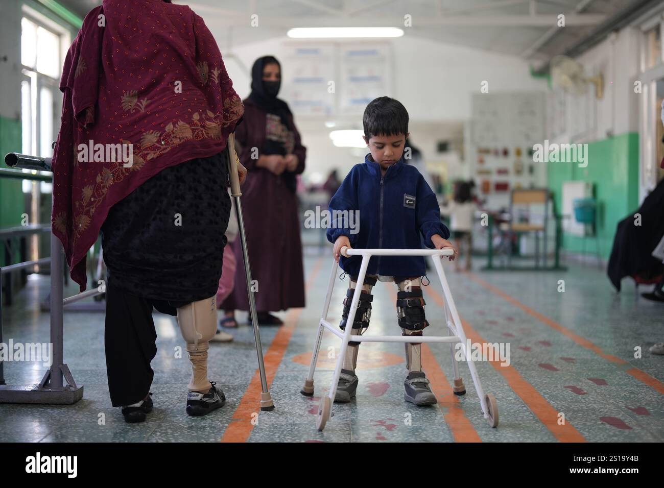 Beijing, Afghanistan. 26th Nov, 2024. A child with prosthetic limbs ...