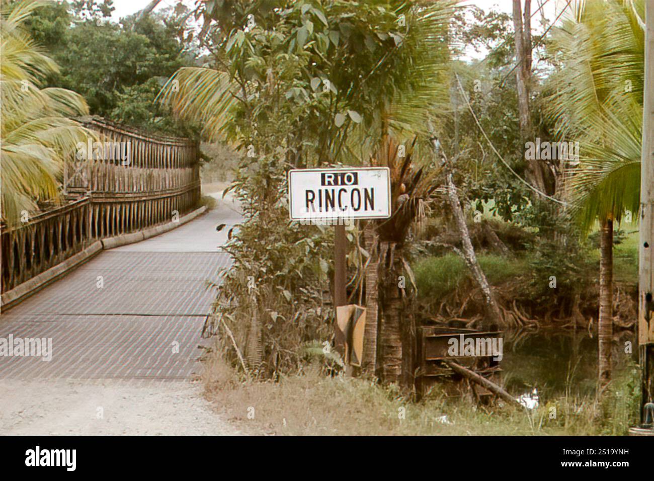 Rincon River, Costa Rica - 2001: Sign and narrow bridge over the Rincon ...