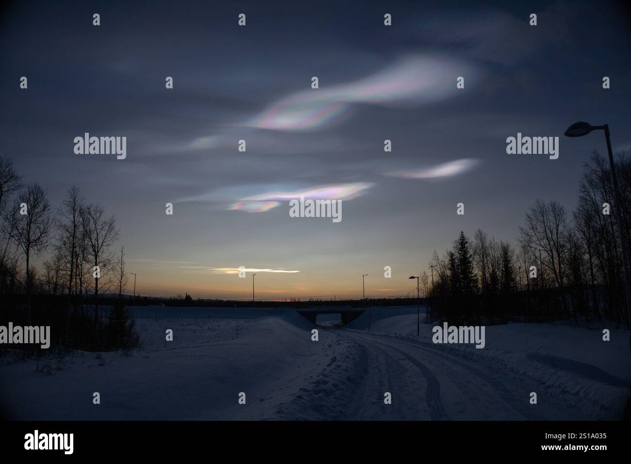 Polar stratospheric cloud, also known as nacreous clouds from nacre, or ...