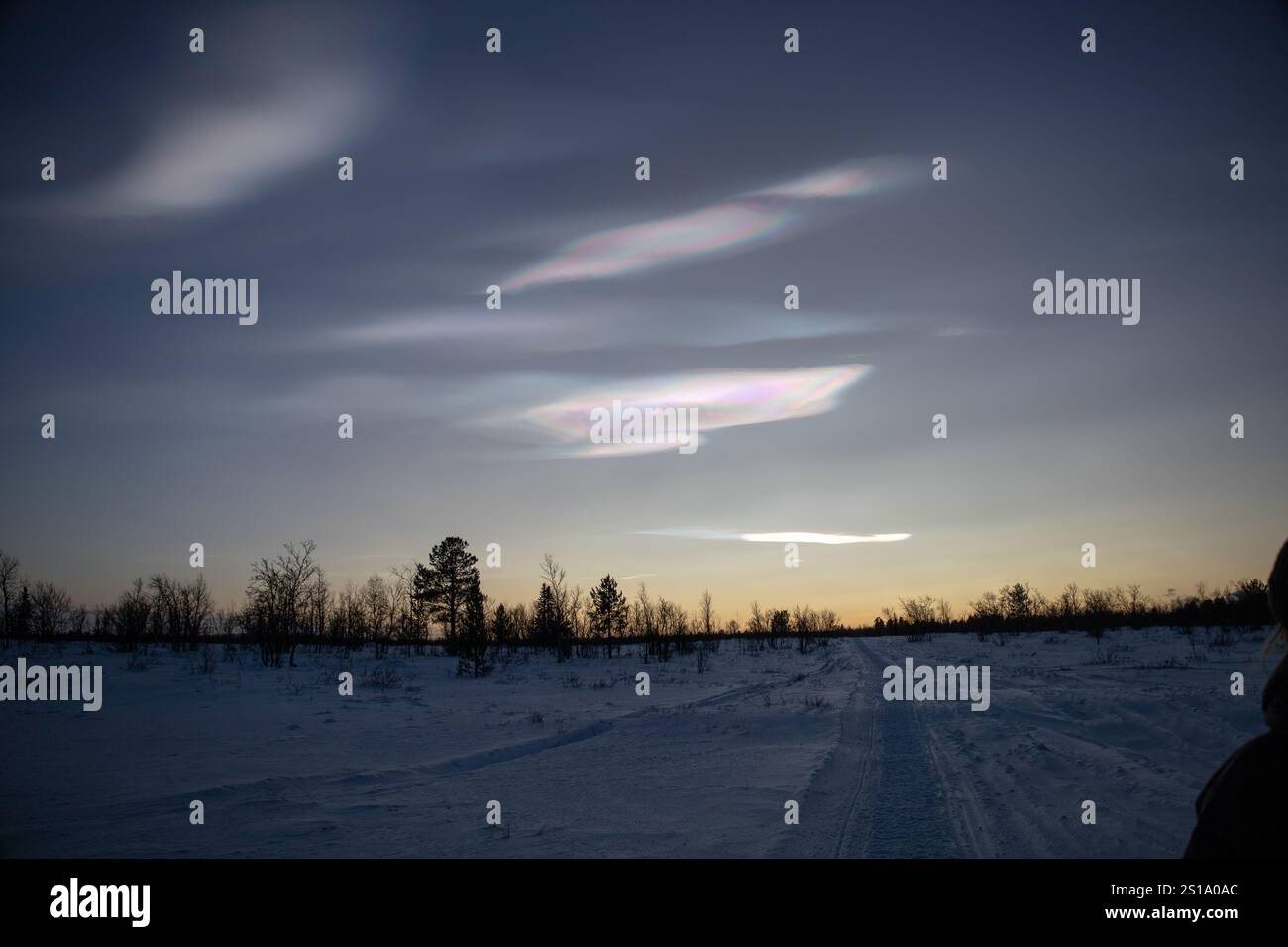 Polar stratospheric cloud, also known as nacreous clouds from nacre, or ...