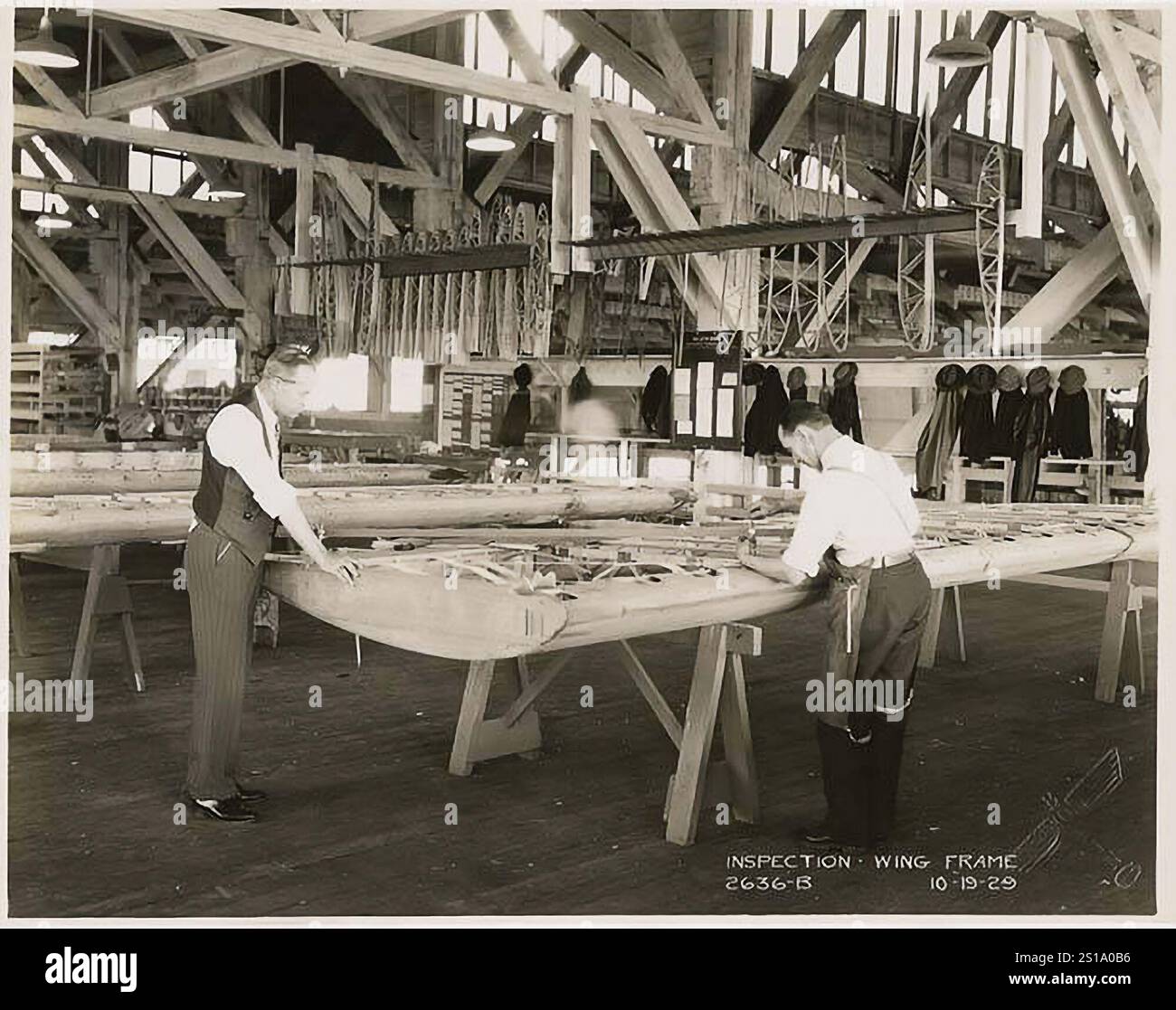 Inspectors examining a wing frame at the Boeing factory, Seattle ...