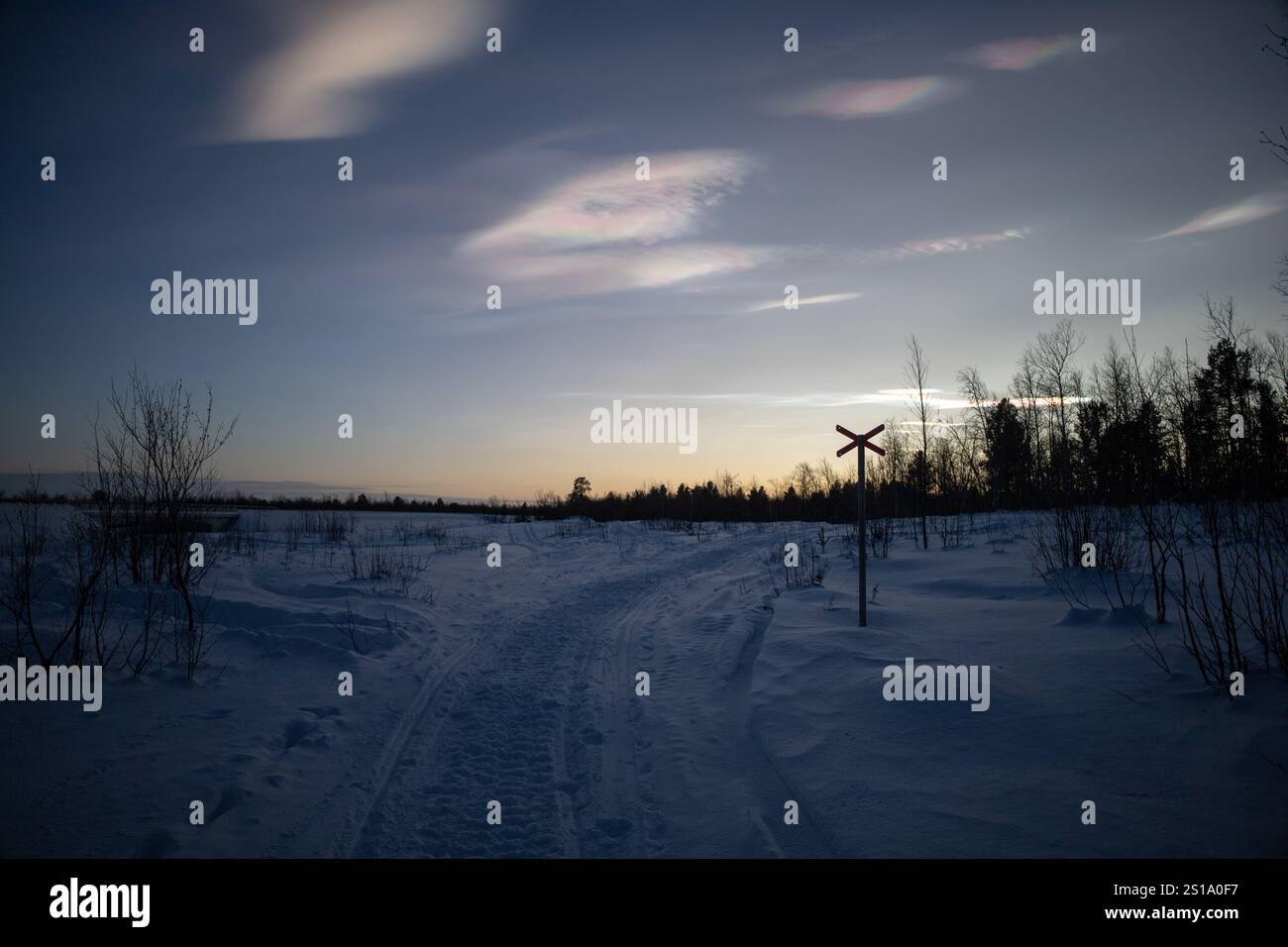 Polar stratospheric cloud, also known as nacreous clouds from nacre, or ...