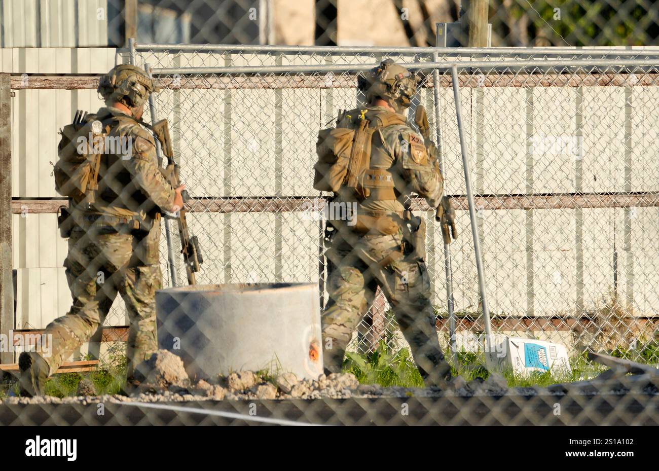 Harris County Sheriff's SWAT members are shown near Crescent Peak Drive ...