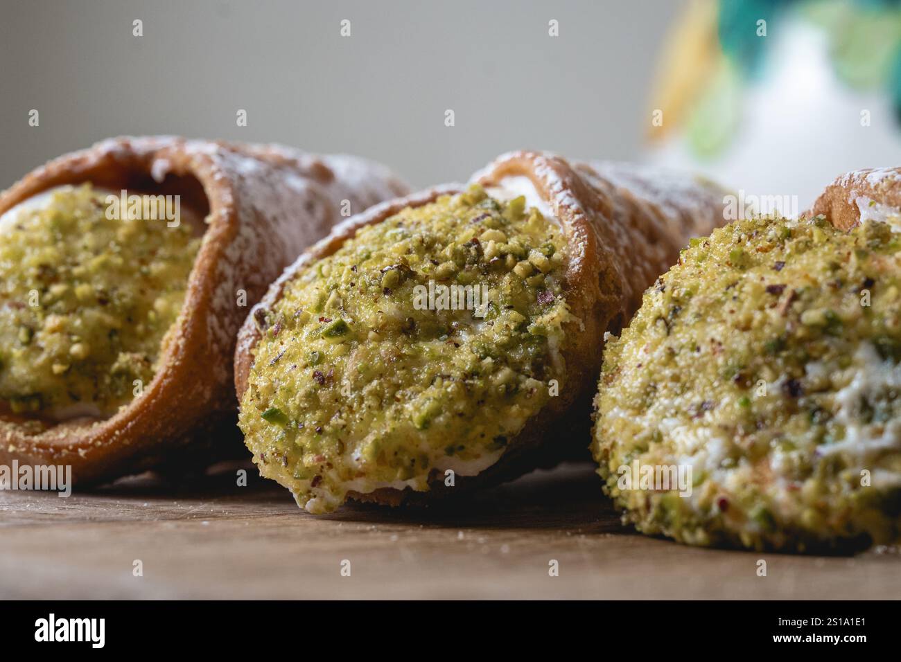 Delicious Sicilian cannoli filled with ricotta and pistachios, styled ...