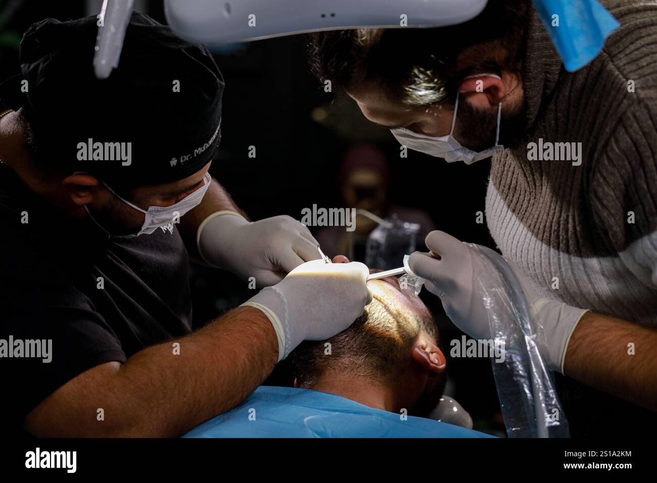 Gaziantep, Turkiye. 31 December 2024. Doctor Muhammed Abbas performs a ...