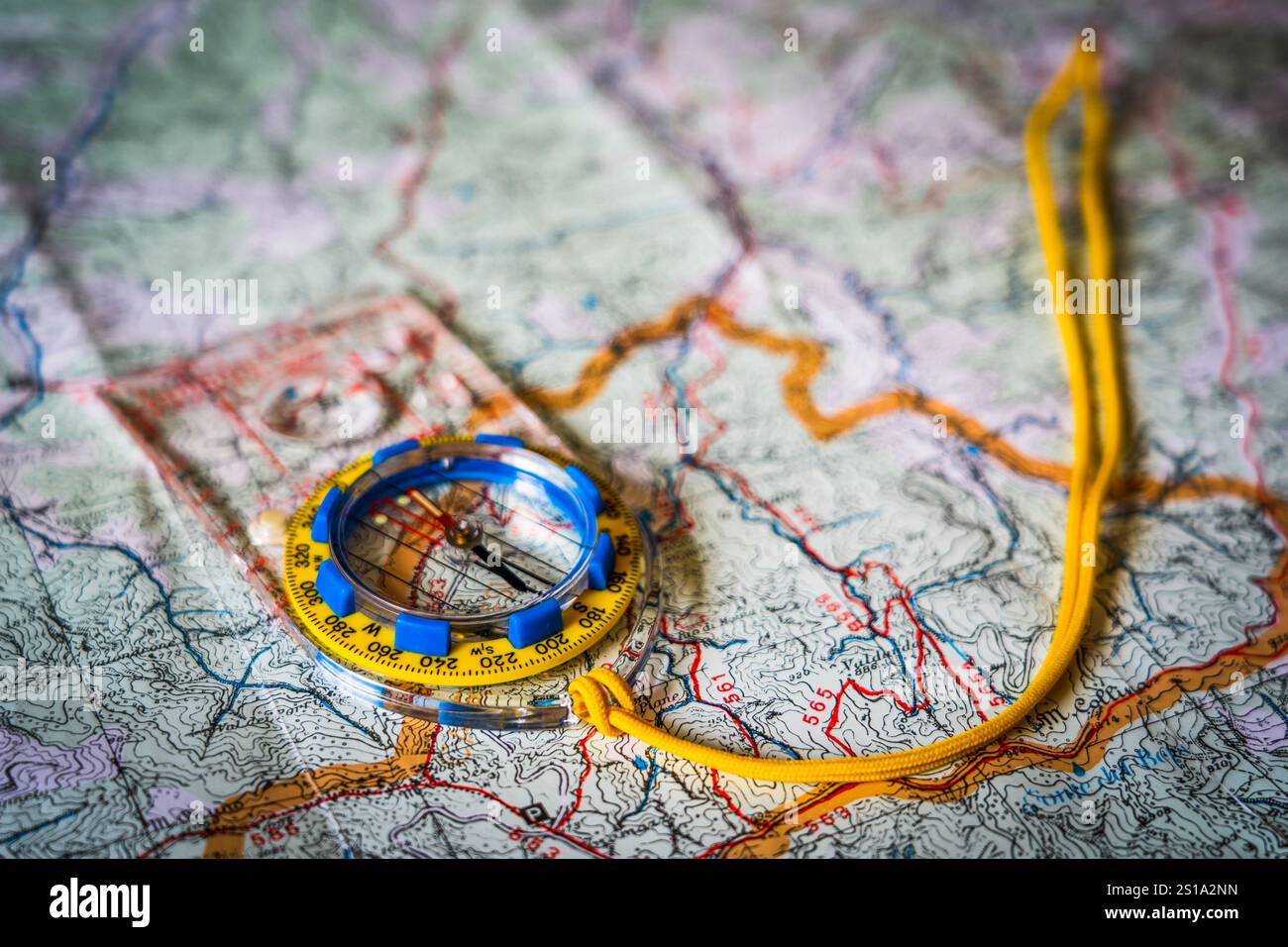Compass with a clear base on a map Stock Photo - Alamy